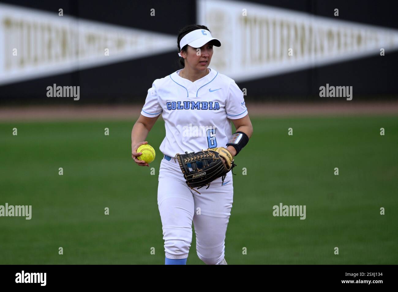 Columbia outfielder Maddie Souza (6) looks to throw after catching a ...