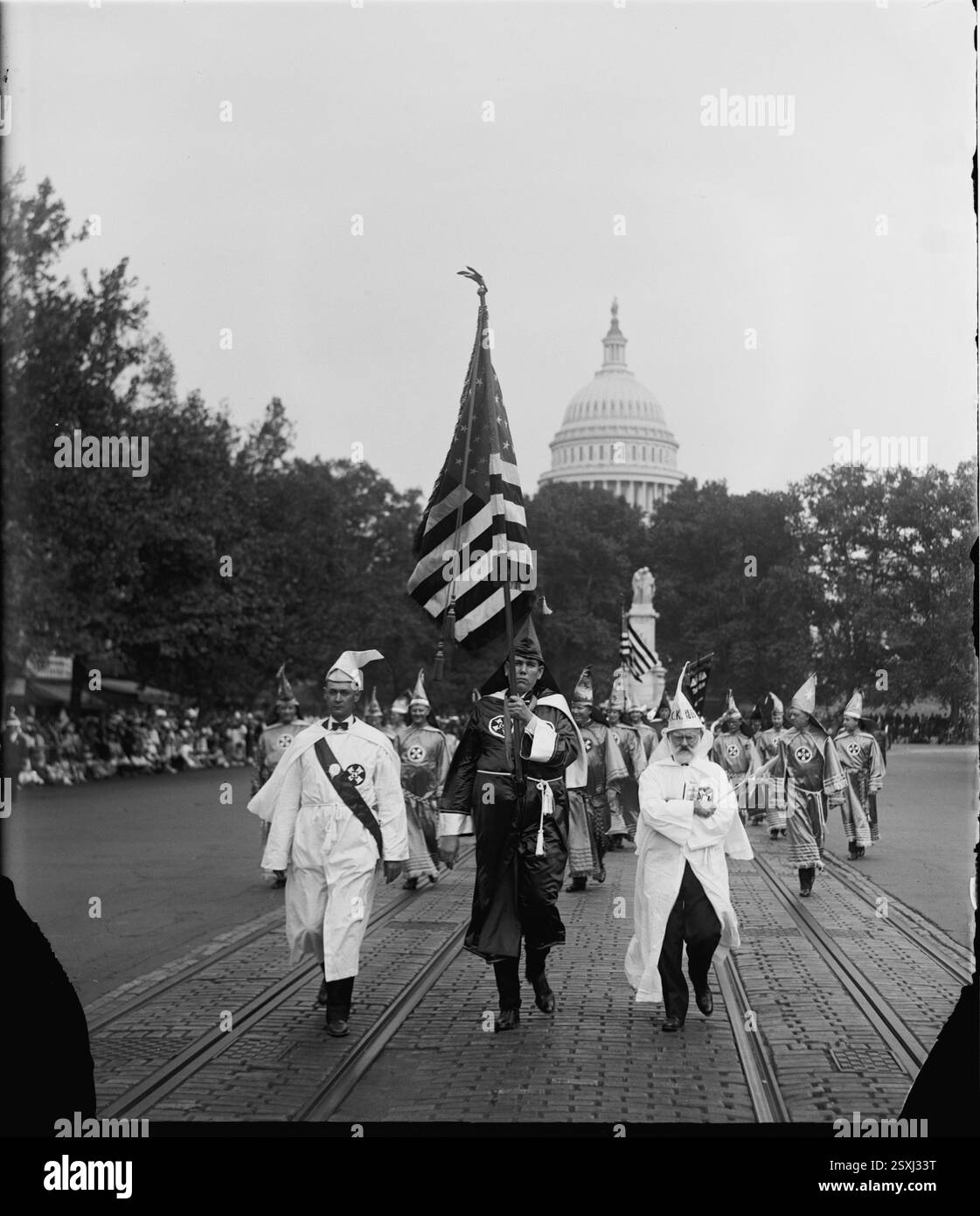 Ku Klux Klan parade, Washington, D.C., USA. Large crowd of KKK members ...