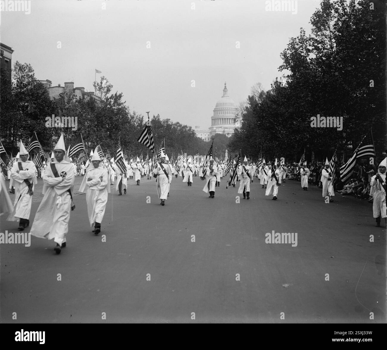 Ku Klux Klan parade, Washington, D.C., USA. Large crowd of KKK members ...