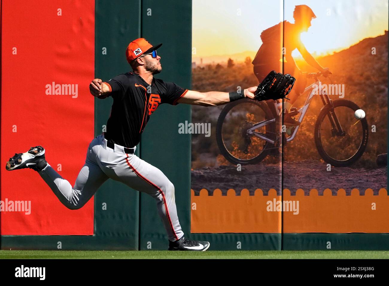 San Francisco Giants' Grant McCray can't catch an RBI double hit by Los ...