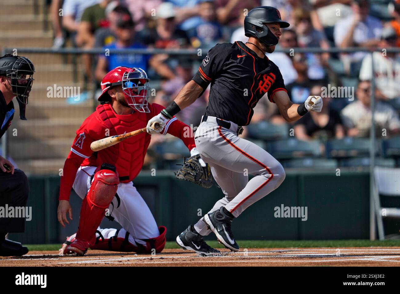 San Francisco Giants' Grant McCray hits against the Los Angeles Angels ...