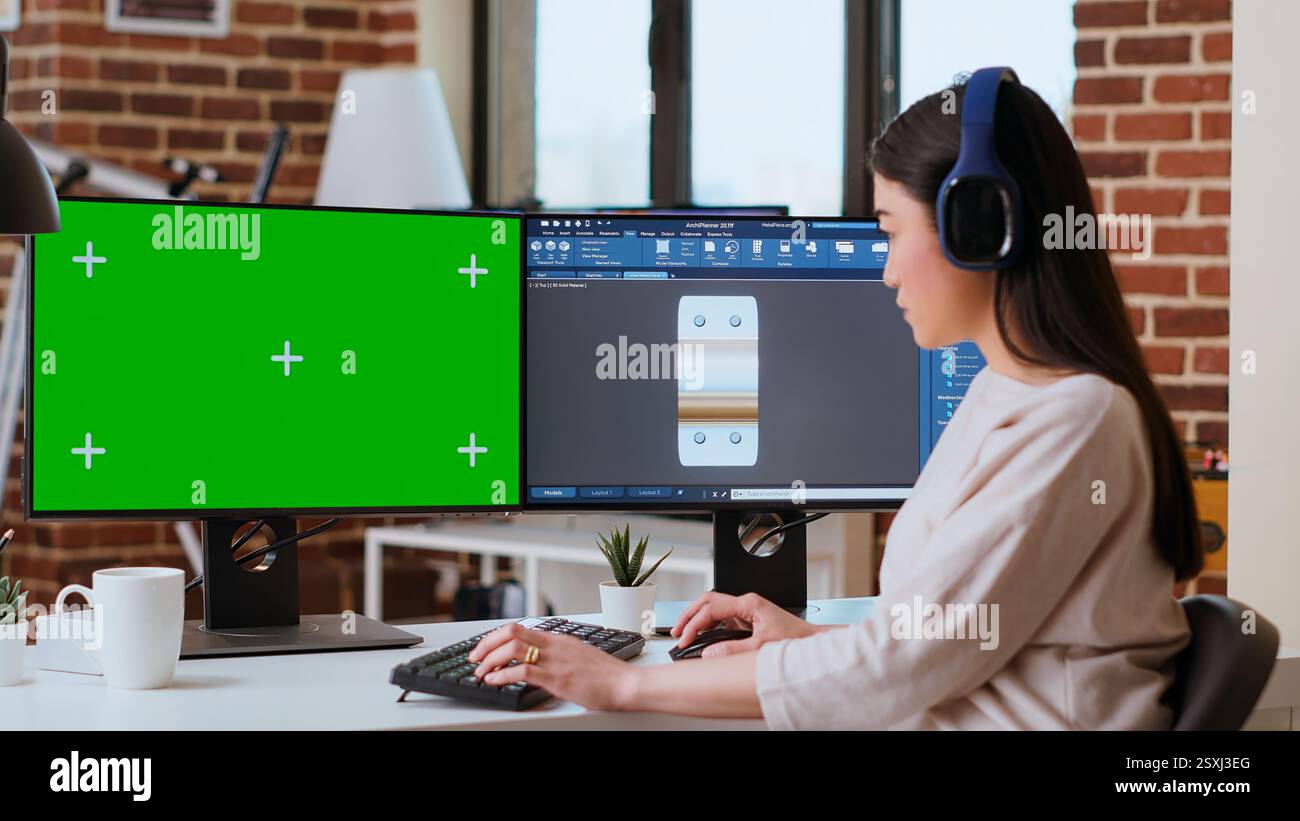 Industrial engineer works with CAD software and isolated mockup in a ...