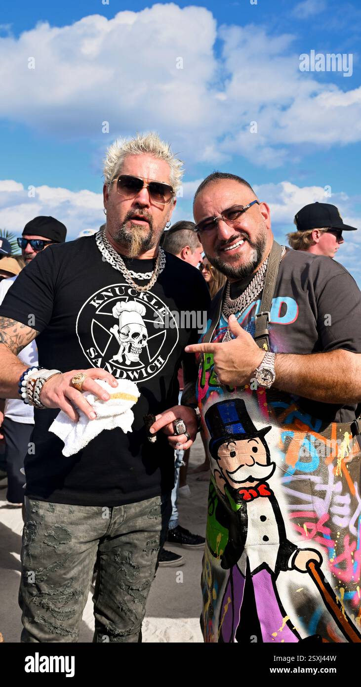 Guy Fieri, left, and David Einhorn appear during 3 to 5 on Ocean Drive ...