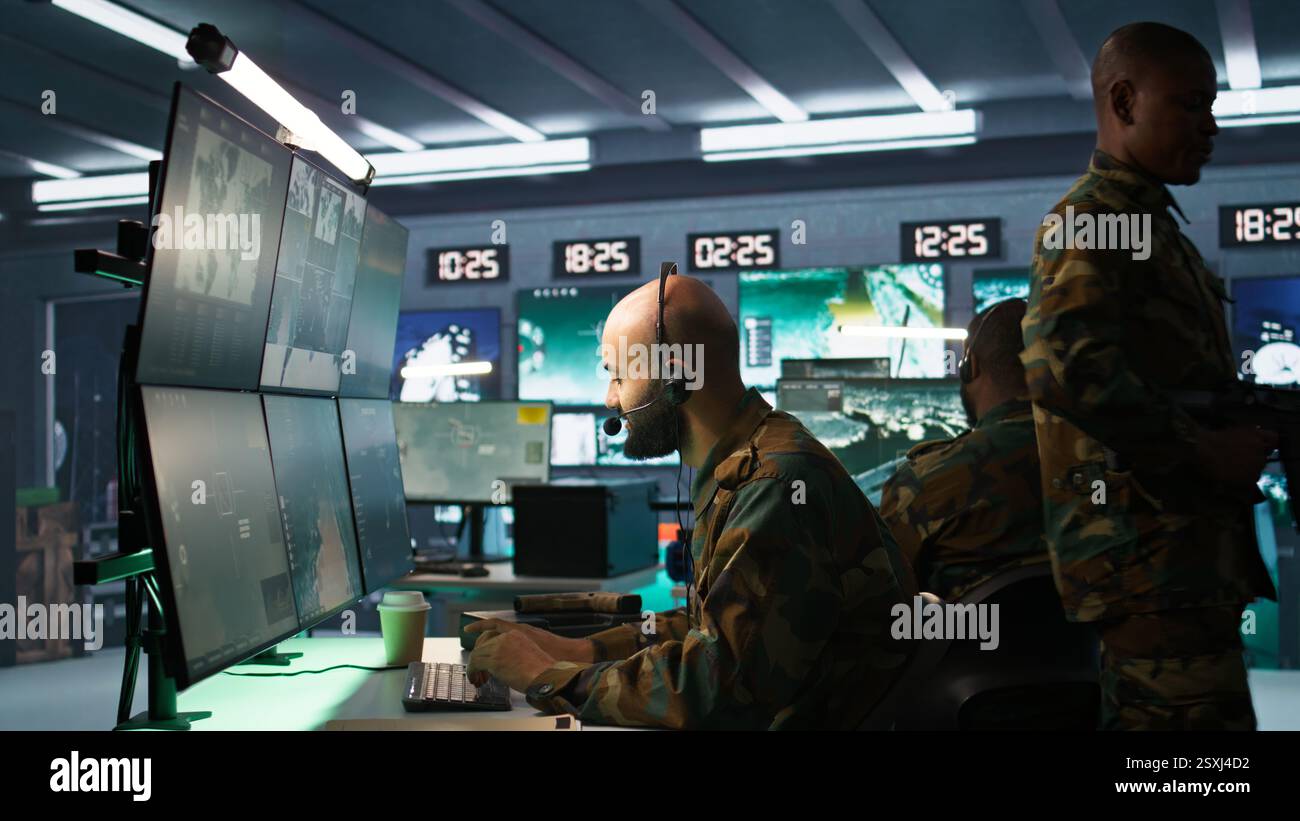 Soldier solving tasks in military HQ base, gathering information on enemy troops. Middle Eastern ...