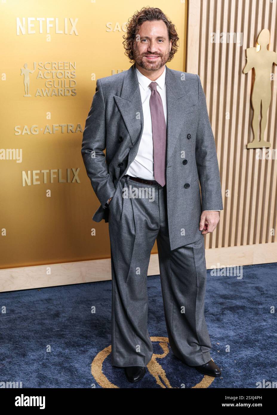 LOS ANGELES, CALIFORNIA, USA - FEBRUARY 23: Edgar Ramirez wearing Saint ...