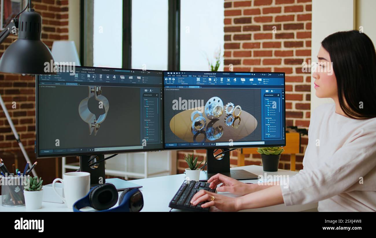 Expert engineer develops industrial prototypes using 3D modeling software at her home office ...