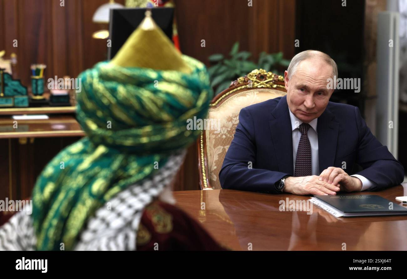 Moscow, Russia. 24th Feb, 2025. Russian President Vladimir Putin, right ...