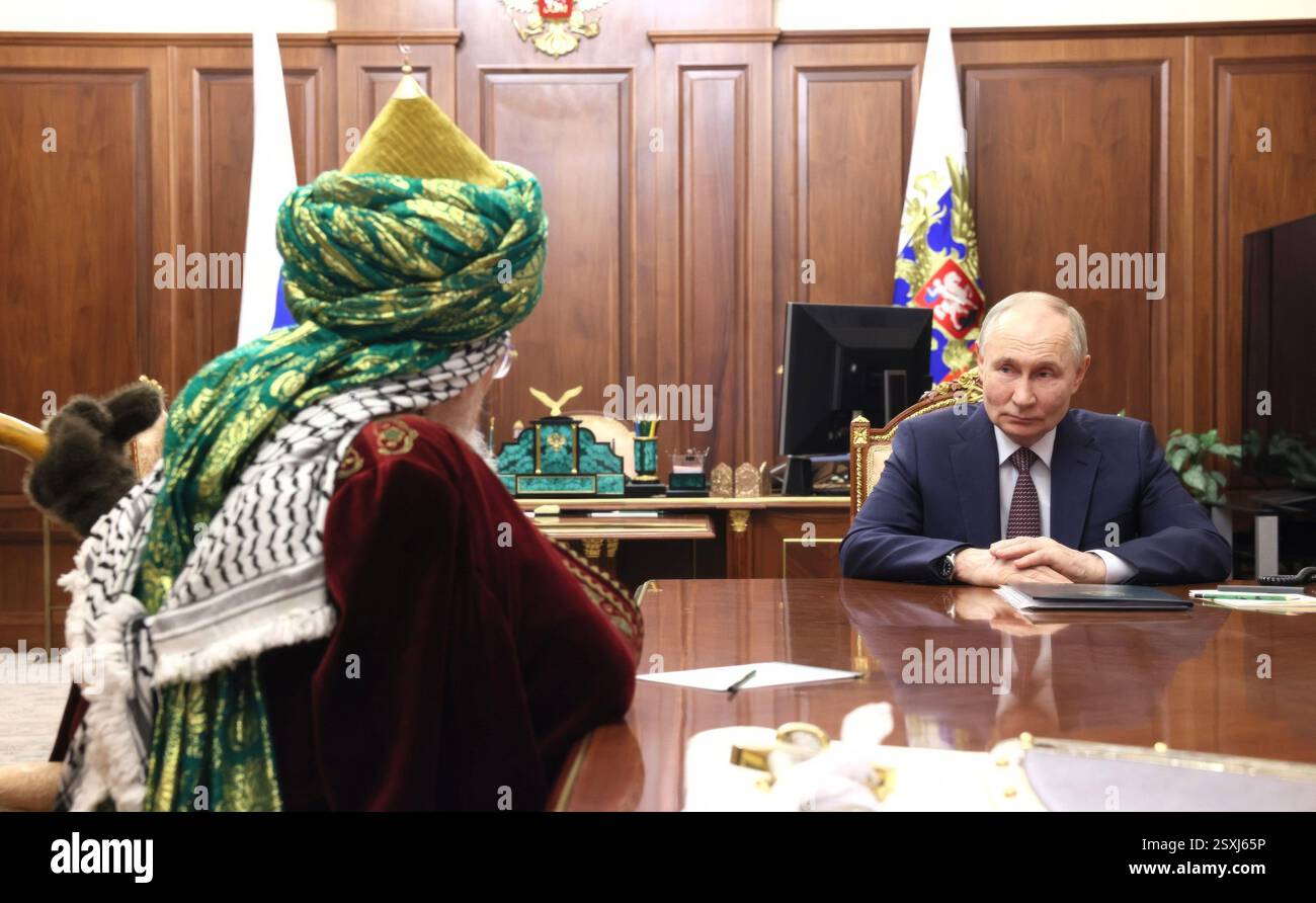 Moscow, Russia. 24th Feb, 2025. Russian President Vladimir Putin, right ...