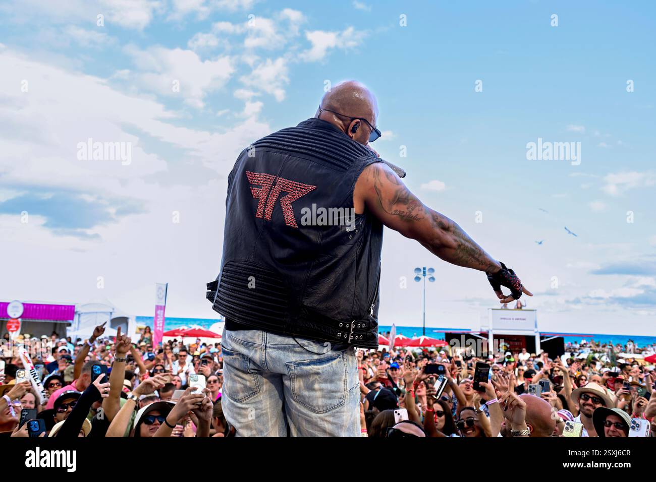 Flo Rida performs on stage during 3 to 5 on Ocean Drive as part of ...