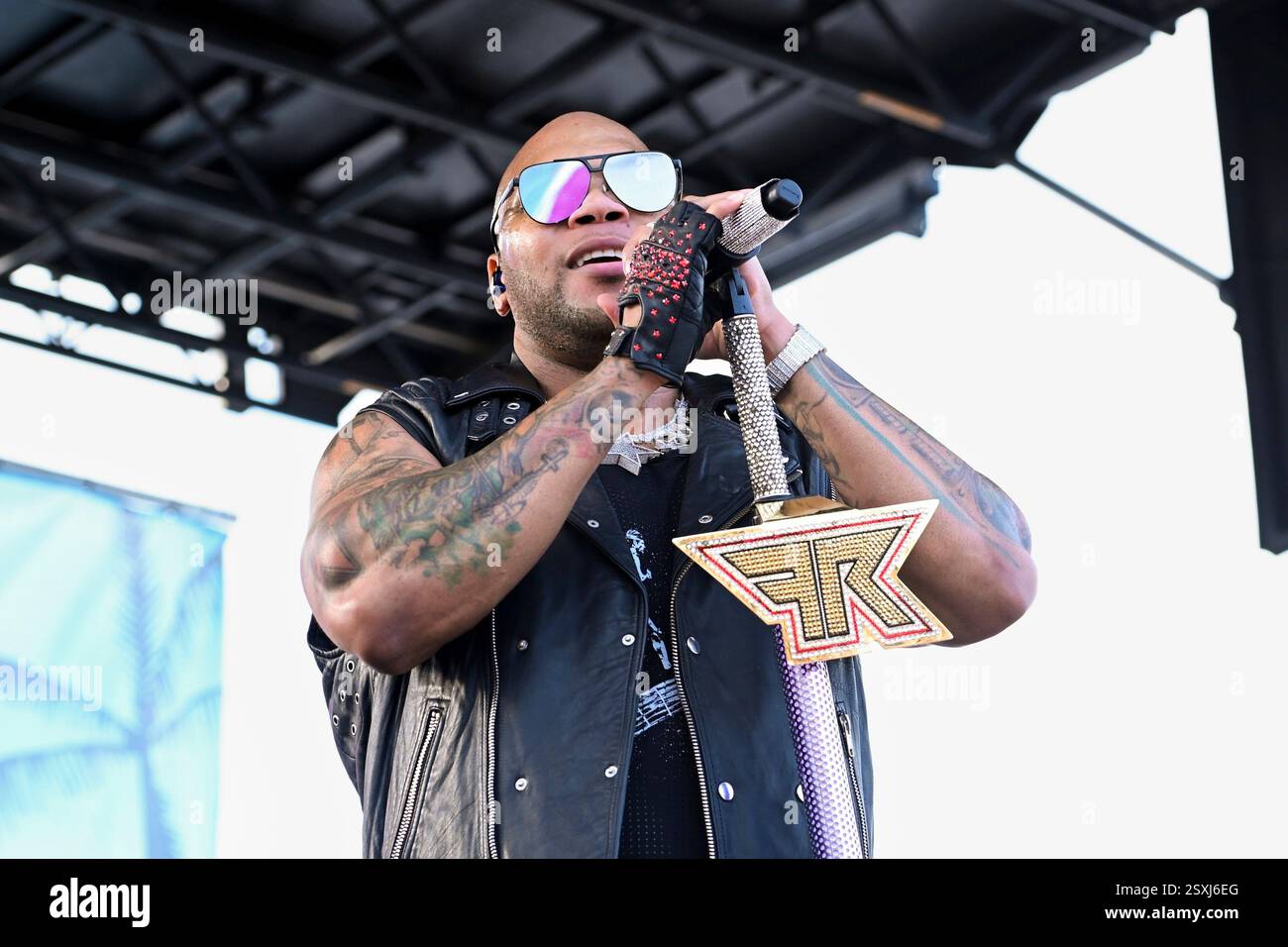 Flo Rida performs on stage during 3 to 5 on Ocean Drive as part of ...