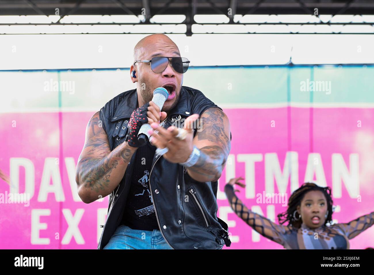 Flo Rida performs on stage during 3 to 5 on Ocean Drive as part of ...