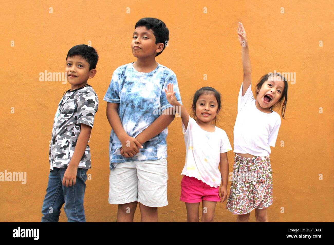 Boys and girls together play and have fun outdoors celebrating their ...