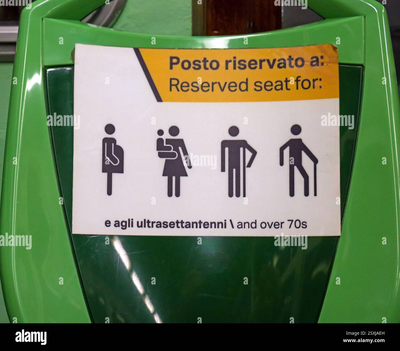 Dual language sign for reserved seats for disabled people and pregnant ...