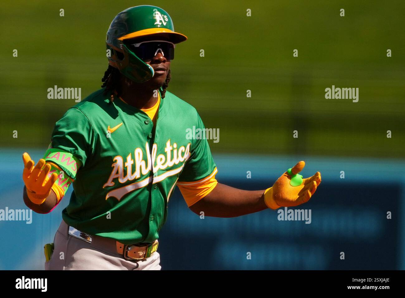 Athletics' Lawrence Butler reacts after hitting a single against the ...