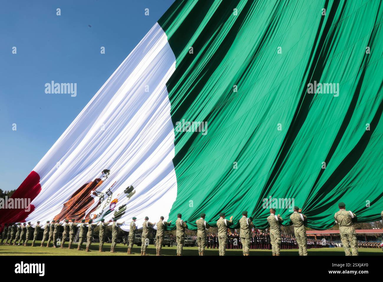 Mexico City, Mexico. 24th Feb, 2025. Mexican soldiers unveil a massive ...