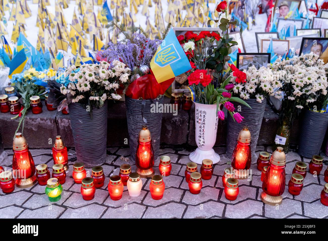 Kyiv, Ukraine. 24th Feb, 2025. Candles for fallen loved ones at the ...