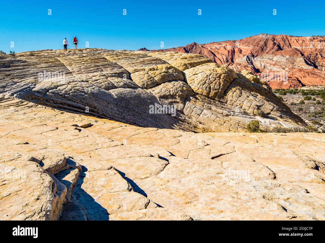 Hikers exploring the geologic wonders of Snow Canyon State Park. This ...