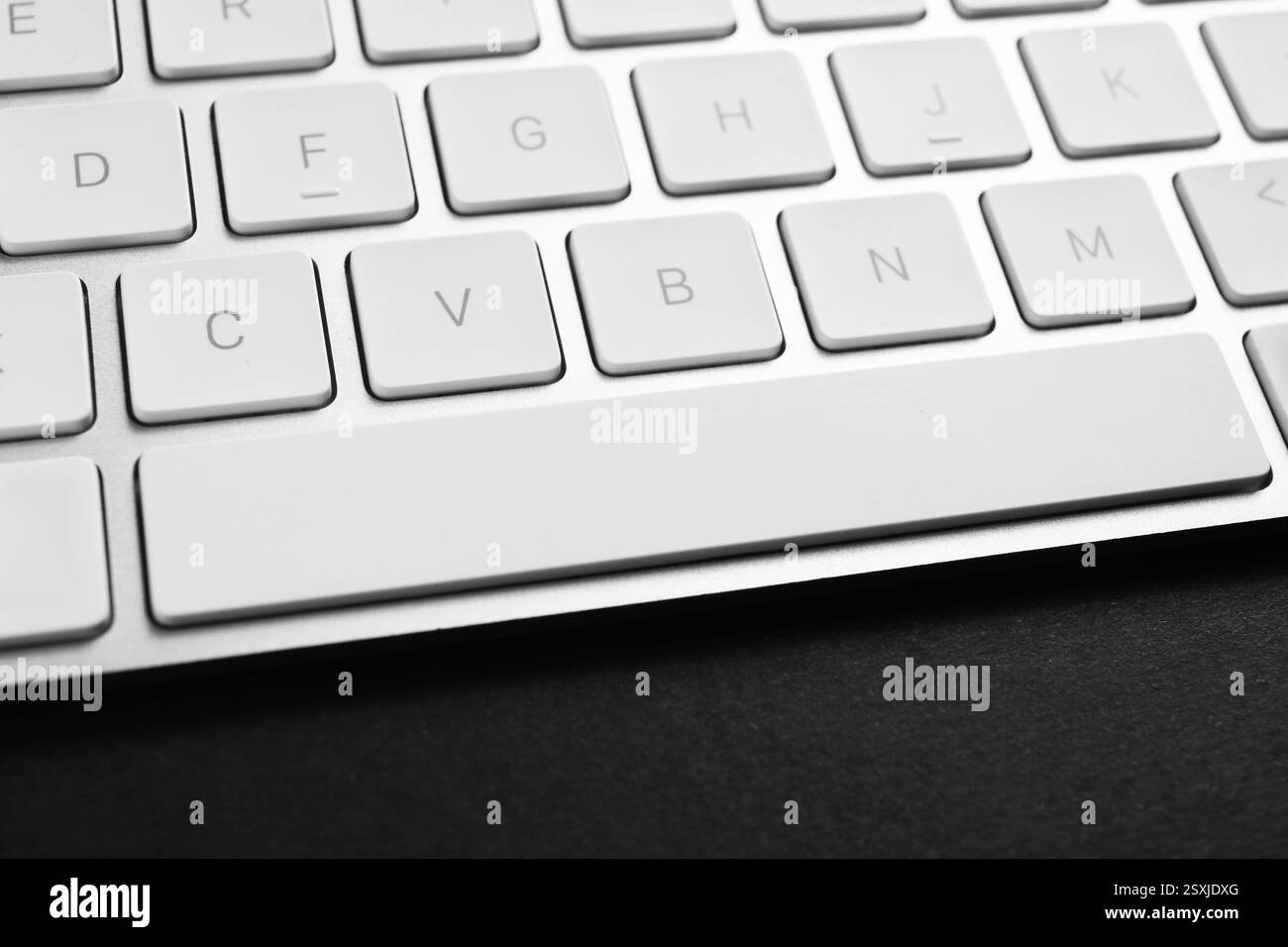 Technical support concept. Modern keyboard on black background, closeup ...