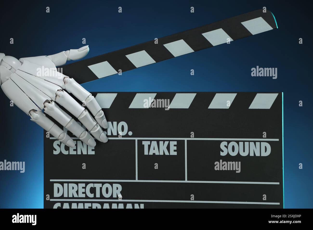 Artificial intelligence. Robot hand with clapper against dark blue ...