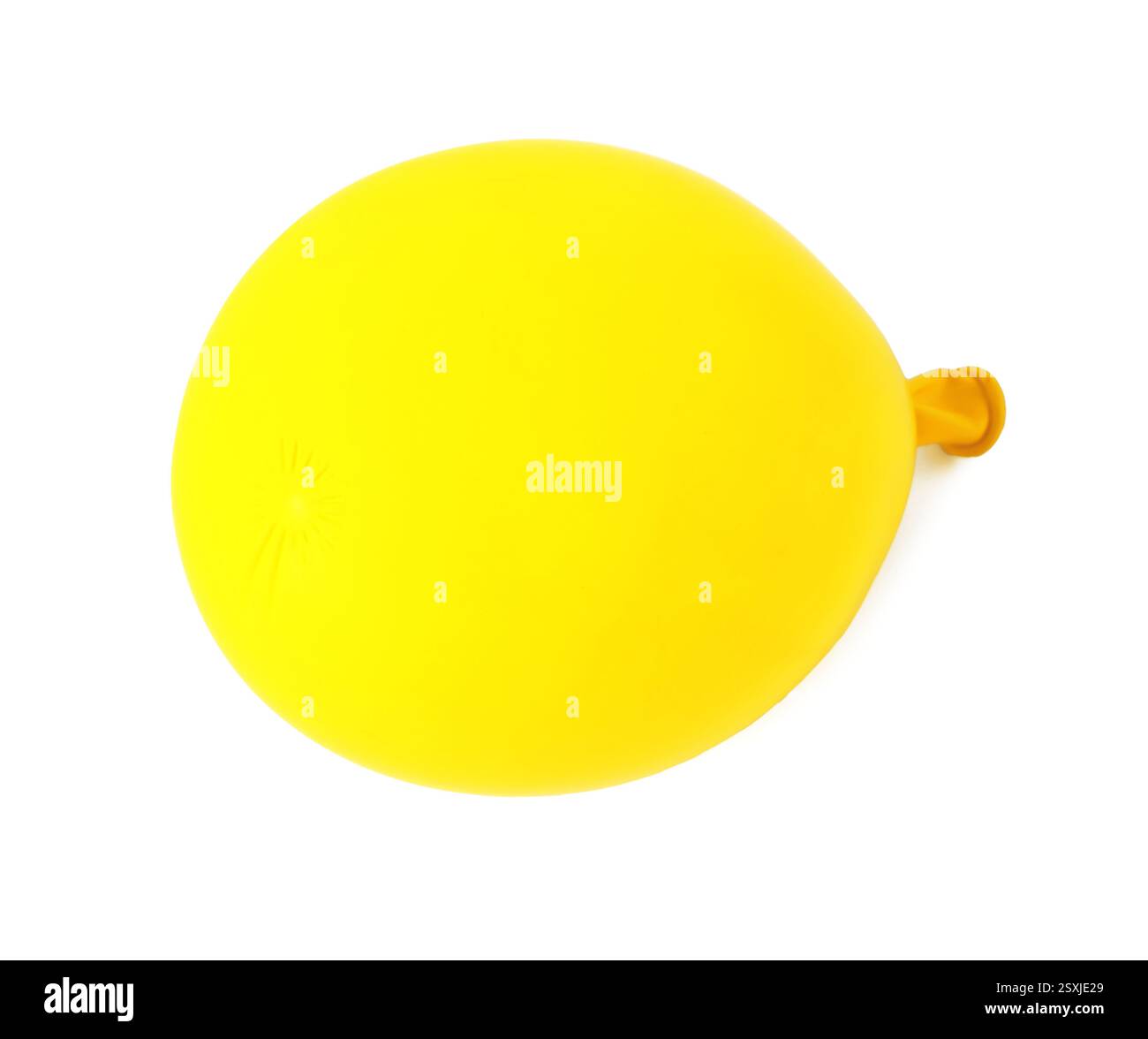 One yellow half deflated balloon isolated on white Stock Photo - Alamy