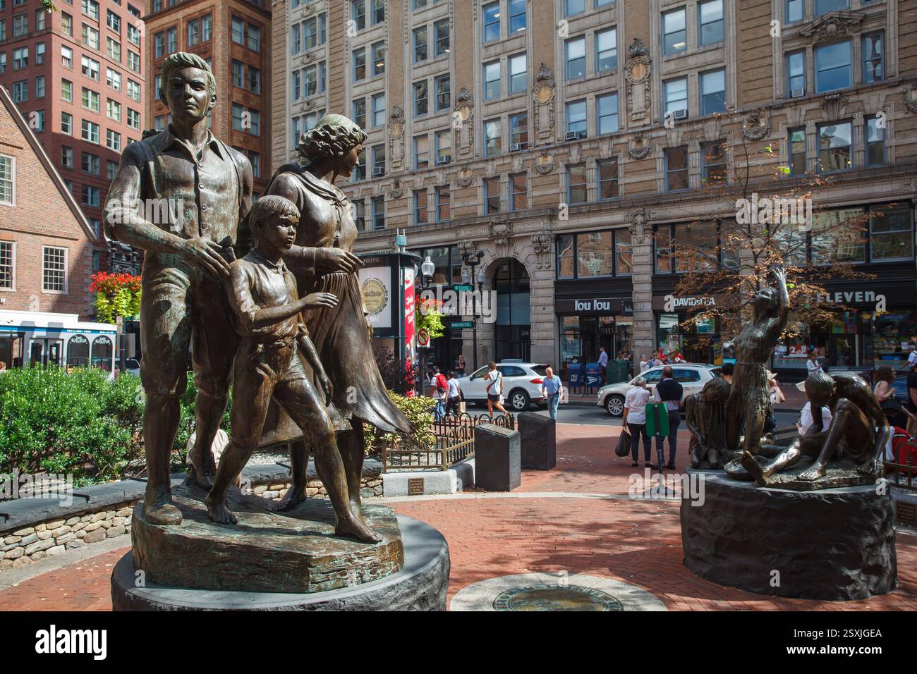 The Boston Irish famine memorial and the typical historical brick ...