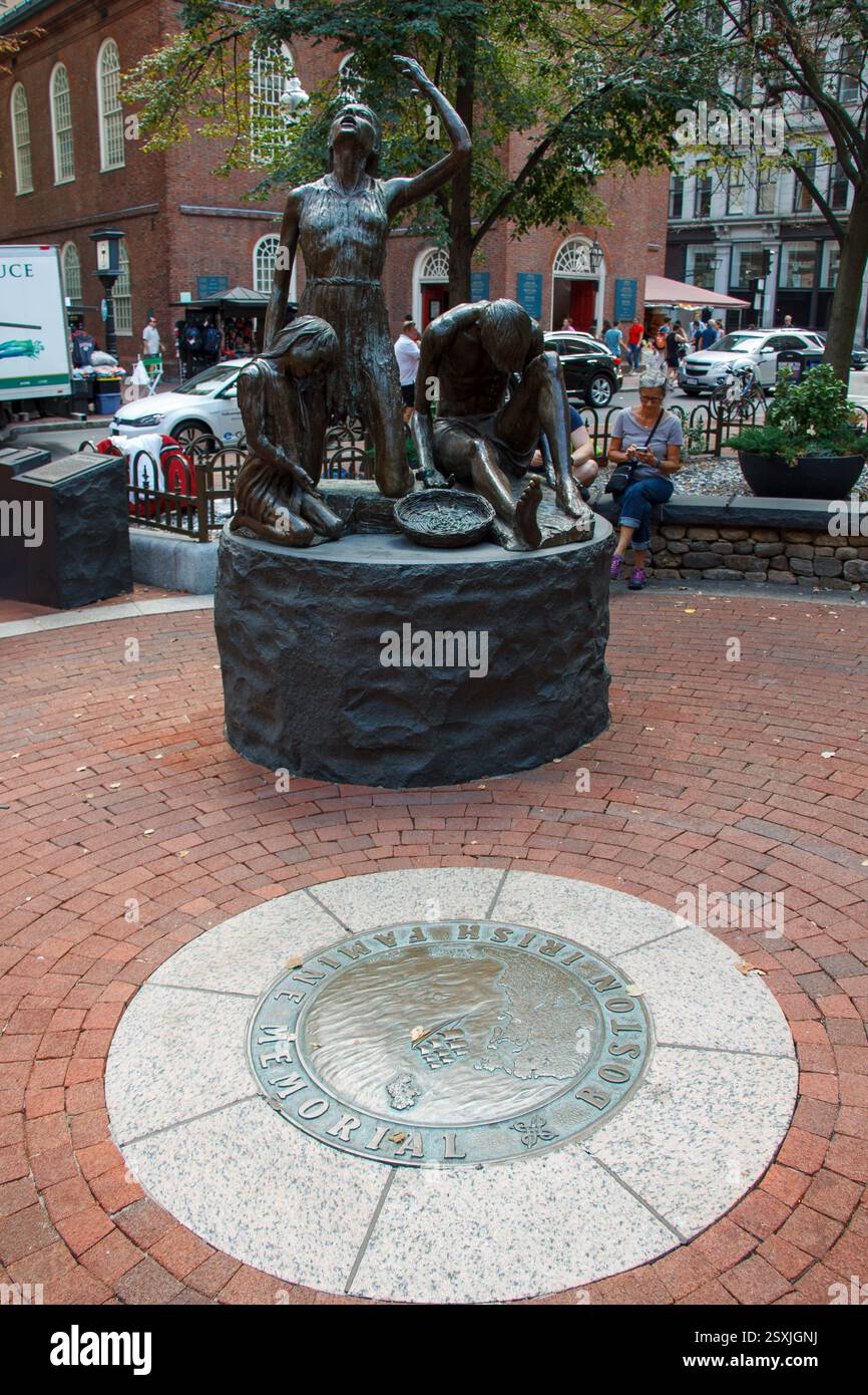The Boston Irish famine memorial and the typical historical brick ...