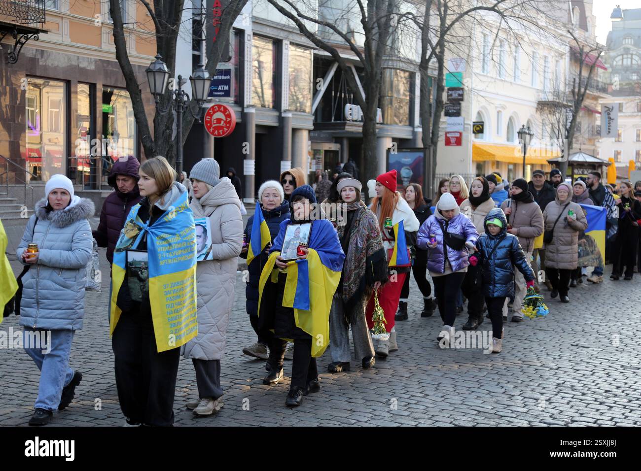 Participants of the commemorative procession walk along Deribasovskaya ...