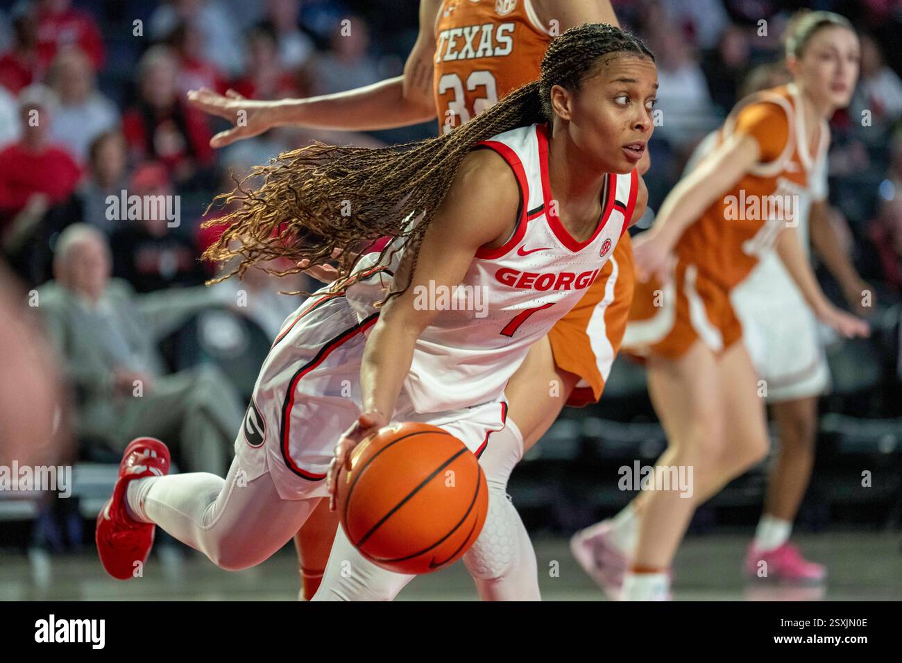 Georgia guard Asia Avinger (1) dribbles during the second half of an ...