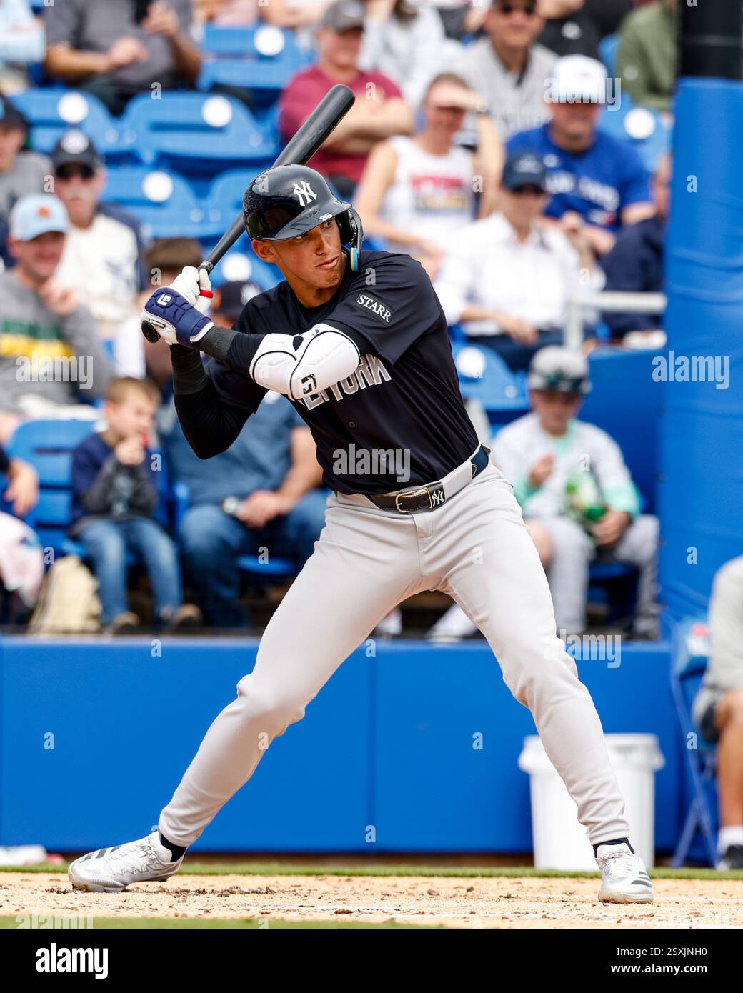 New York Yankees infielder George Lombard Jr. up to bat at a baseball ...