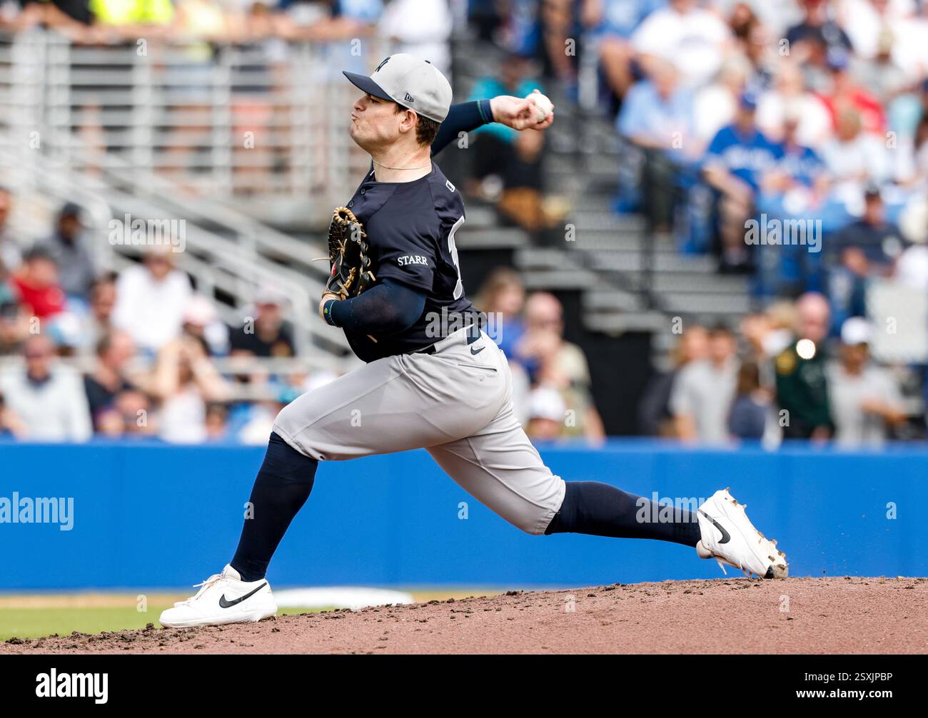 New York Yankees pitcher Harrison Cohen replaces Carlos Rodon on the mound in the bottom of the ...