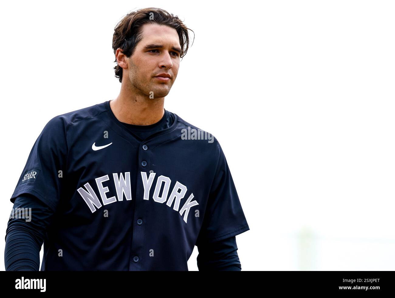New York Yankees outfielder Spencer Jones in between innings at a ...