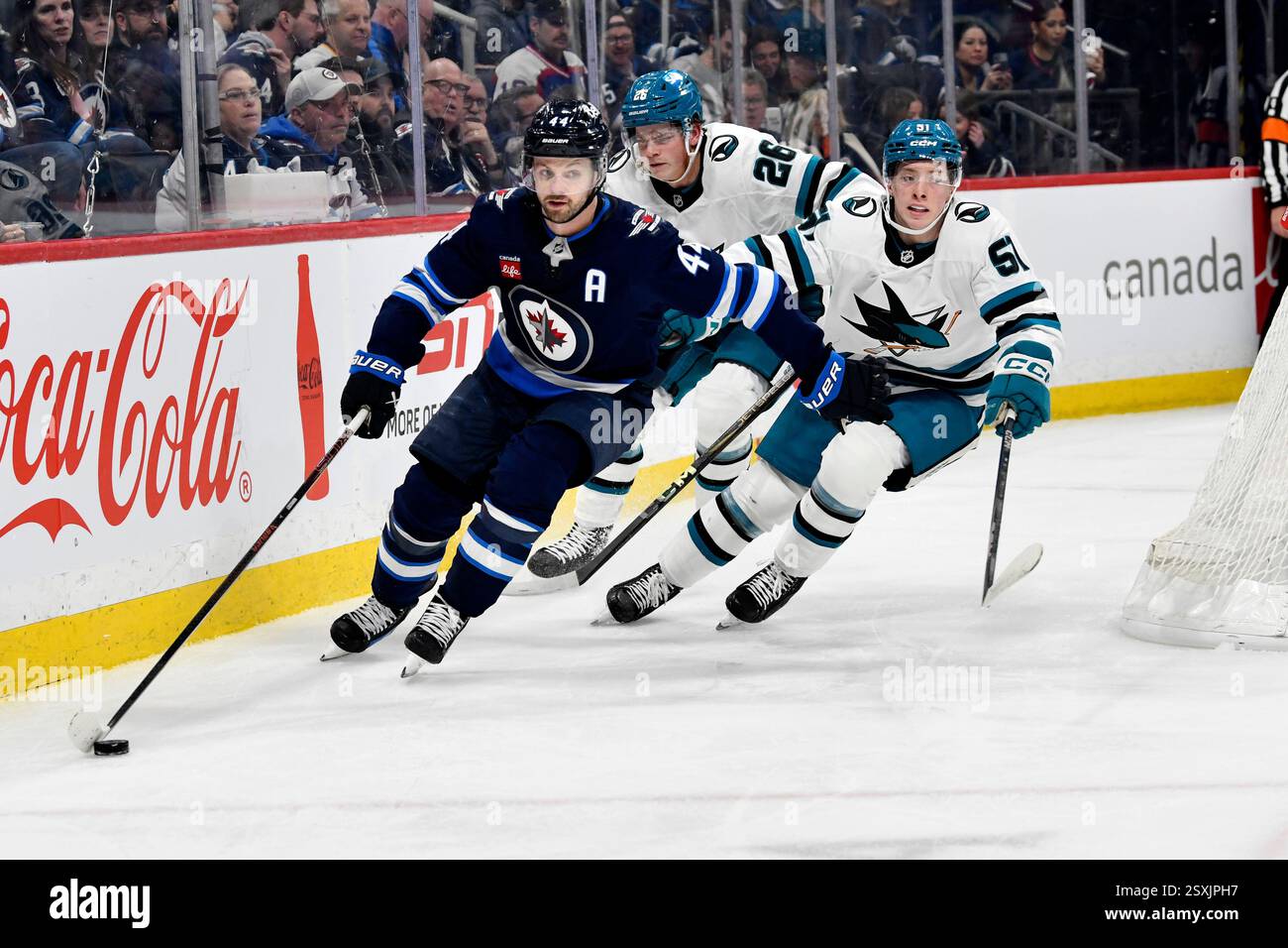 Winnipeg Jets' Josh Morrissey (44) carries the puck around San Jose ...
