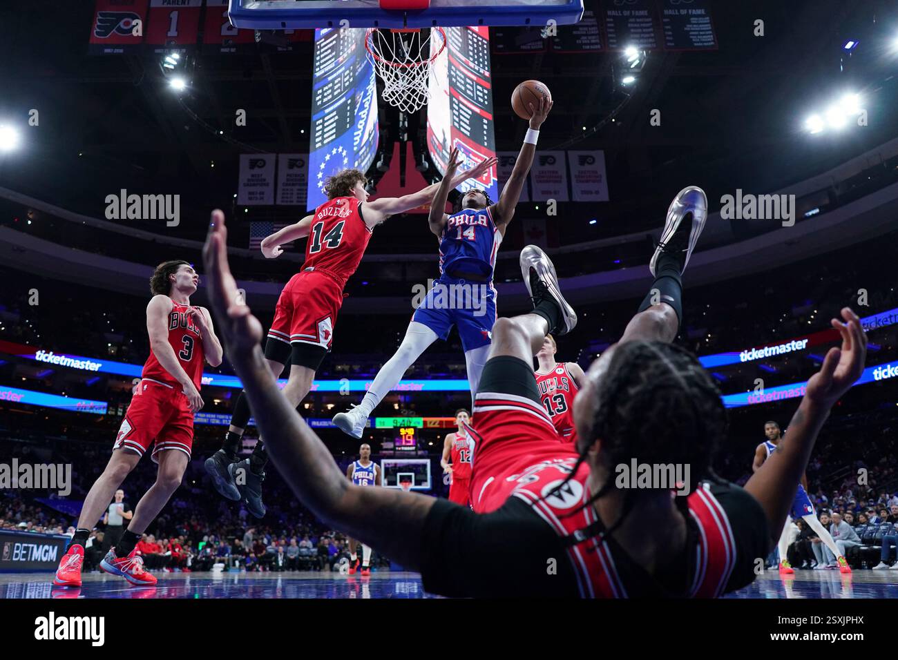 Philadelphia 76ers' Ricky Council IV, right, goes up for a shot against ...