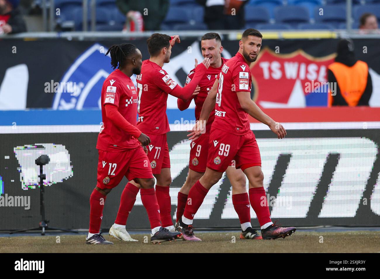 Players of Wisla Krakow celebrate after scoring a goal during BETCLIC 1 ...