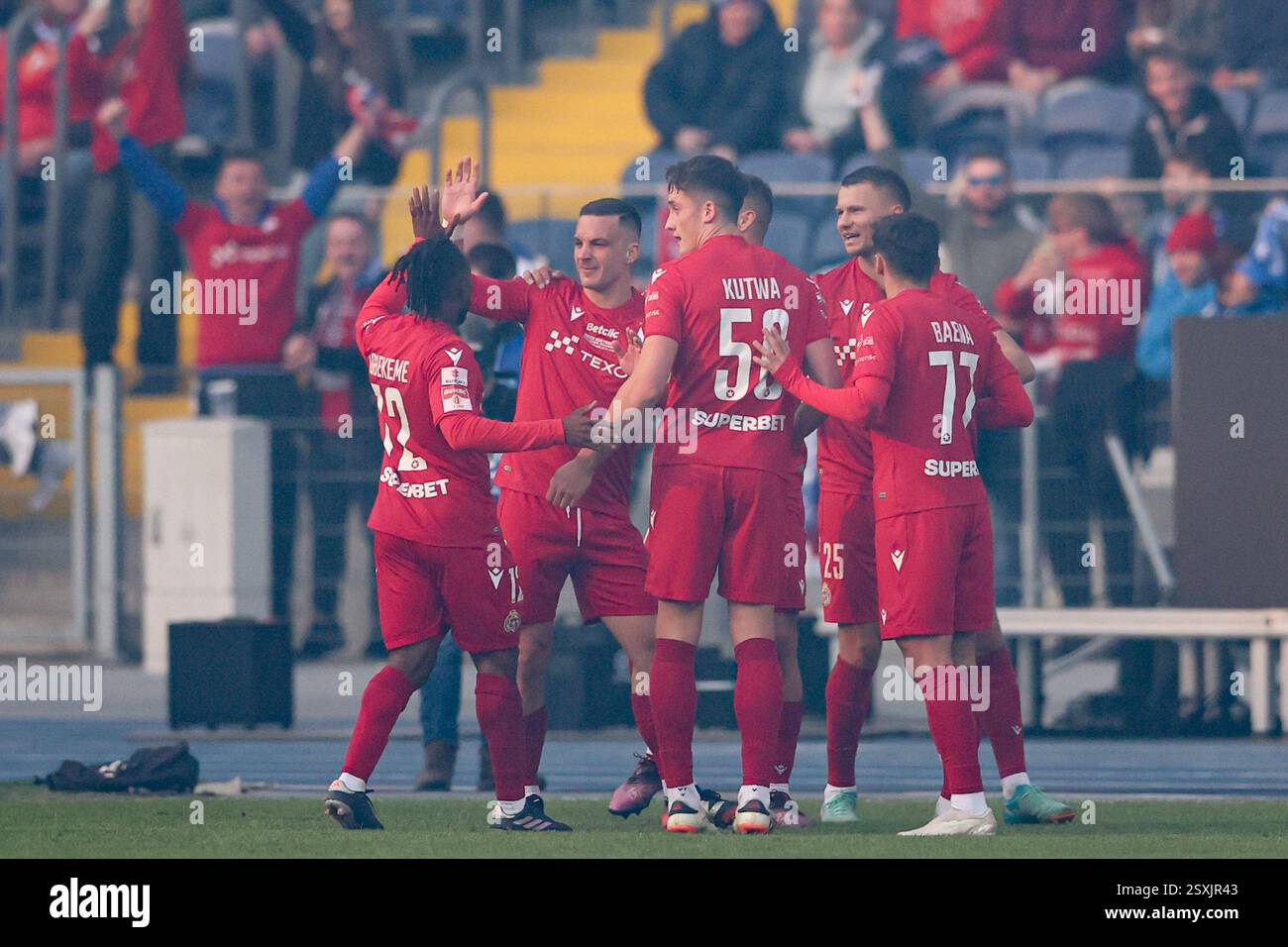 Players of Wisla Krakow celebrate after scoring a goal during BETCLIC 1 ...