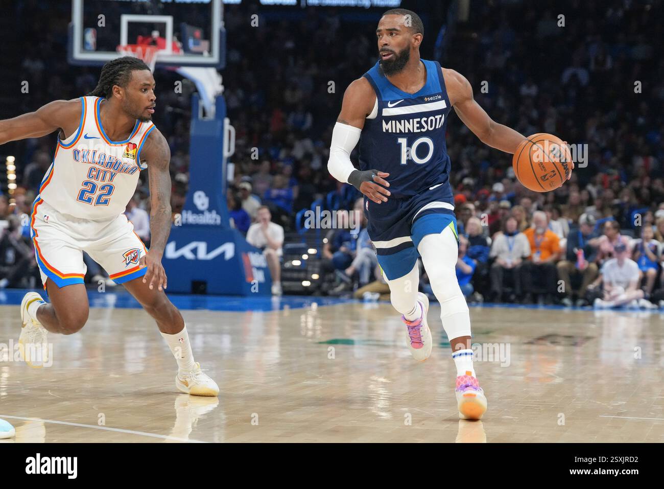 Minnesota Timberwolves guard Mike Conley (10) pushes past Oklahoma City ...