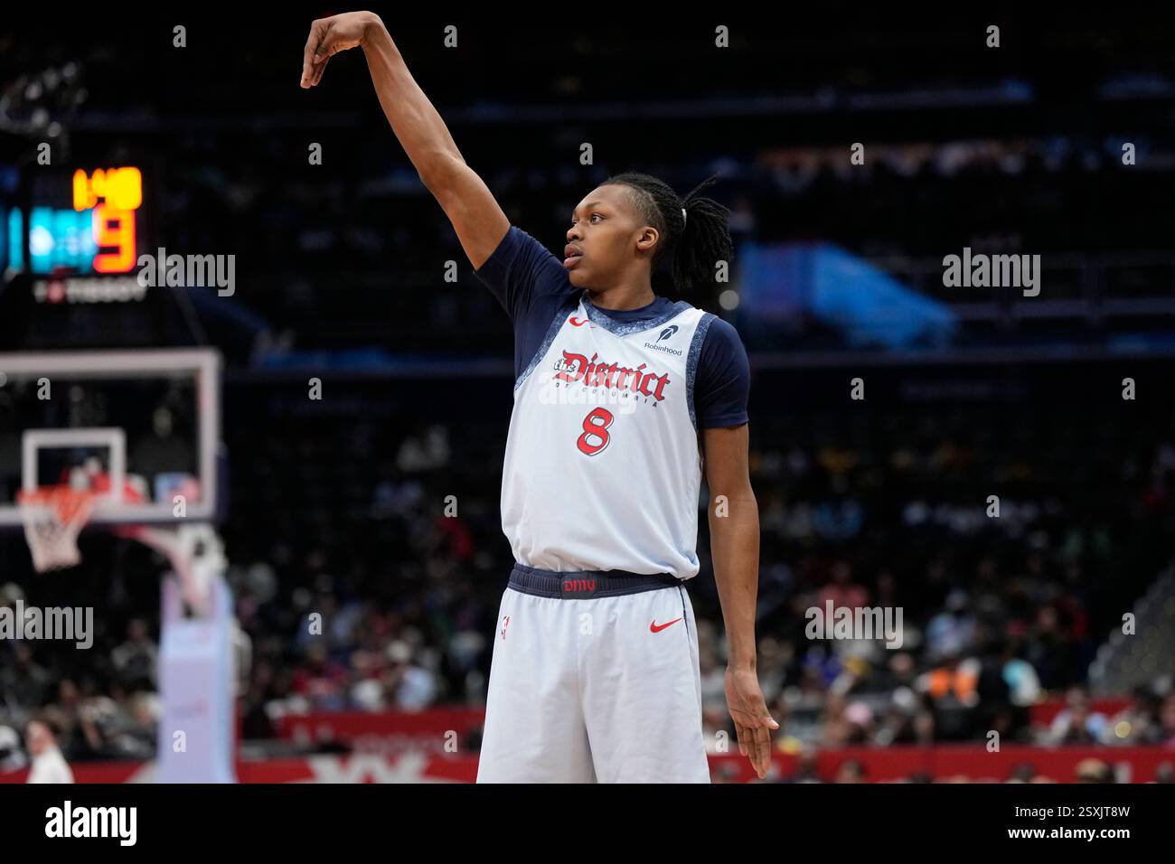 Washington Wizards guard Bub Carrington follows through after scoring a ...