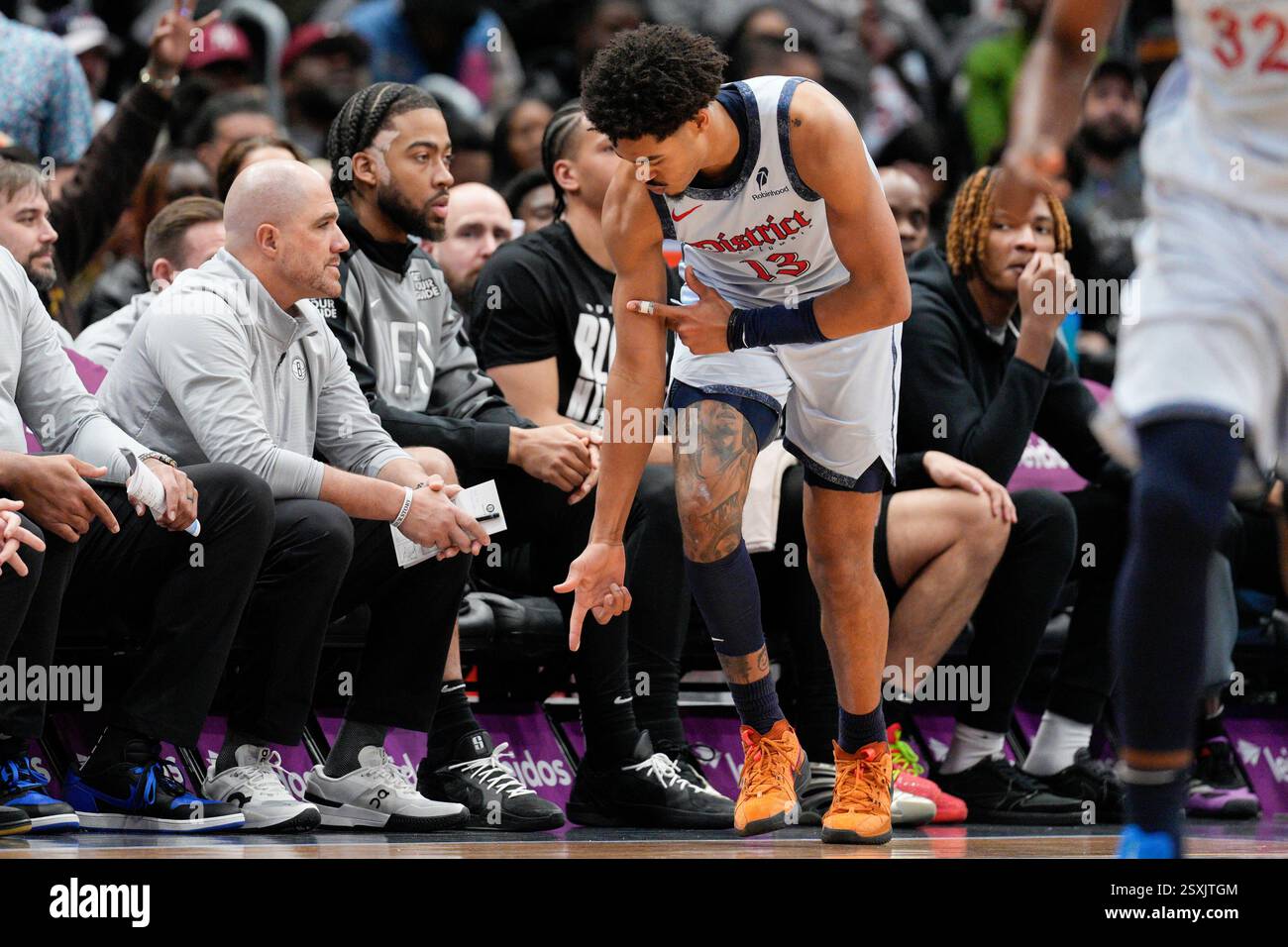 Washington Wizards guard Jordan Poole (13) gestures after scoring a 3 ...