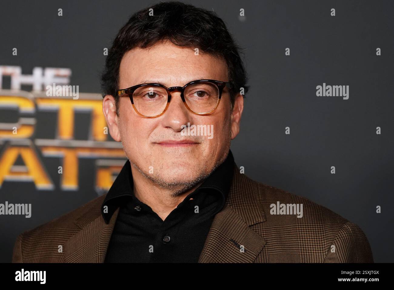 Anthony Russo arrives at the premiere of "The Electric State" on Monday ...