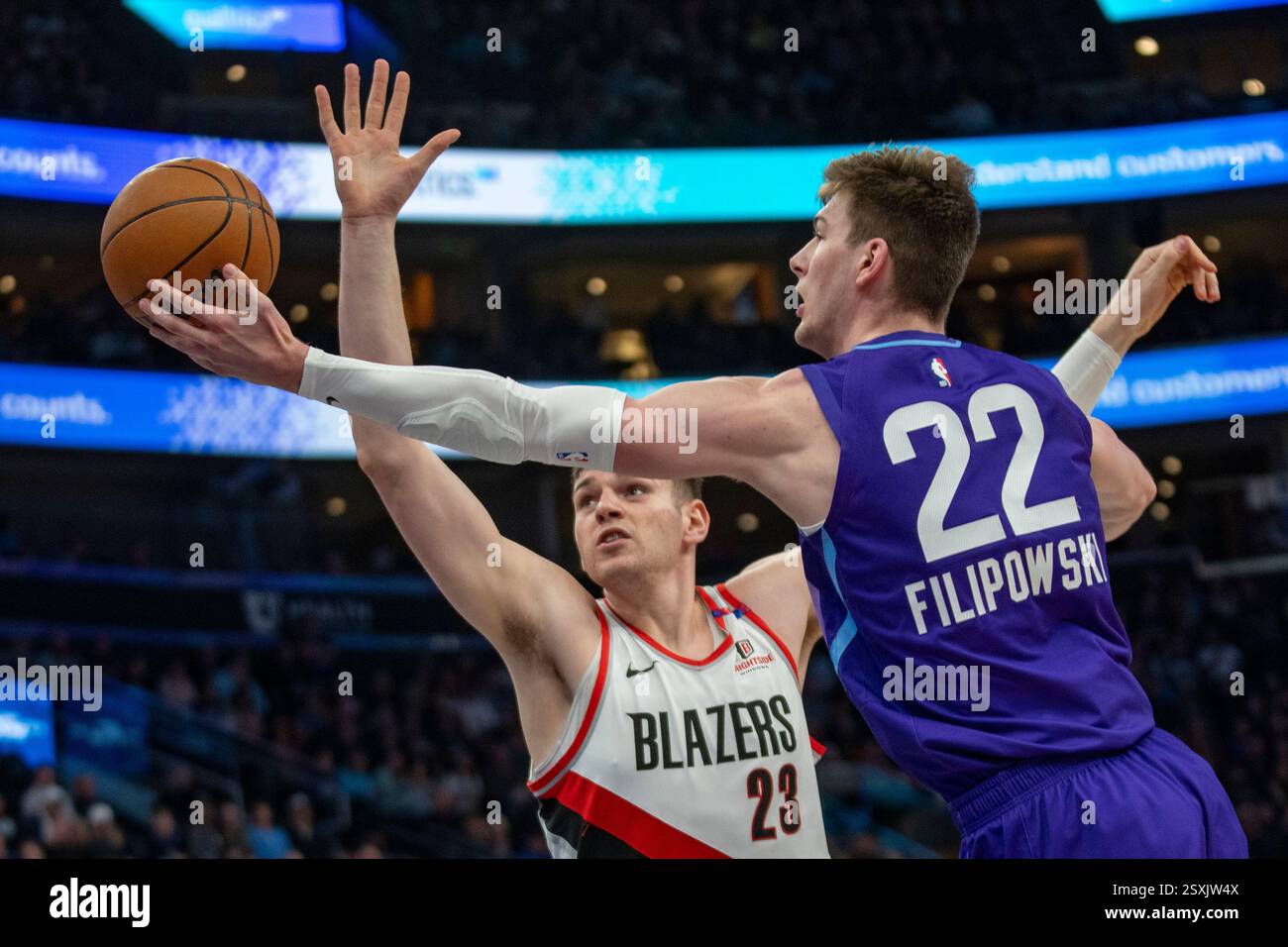 Utah Jazz forward Kyle Filipowski (22) goes for an underhand shot as ...