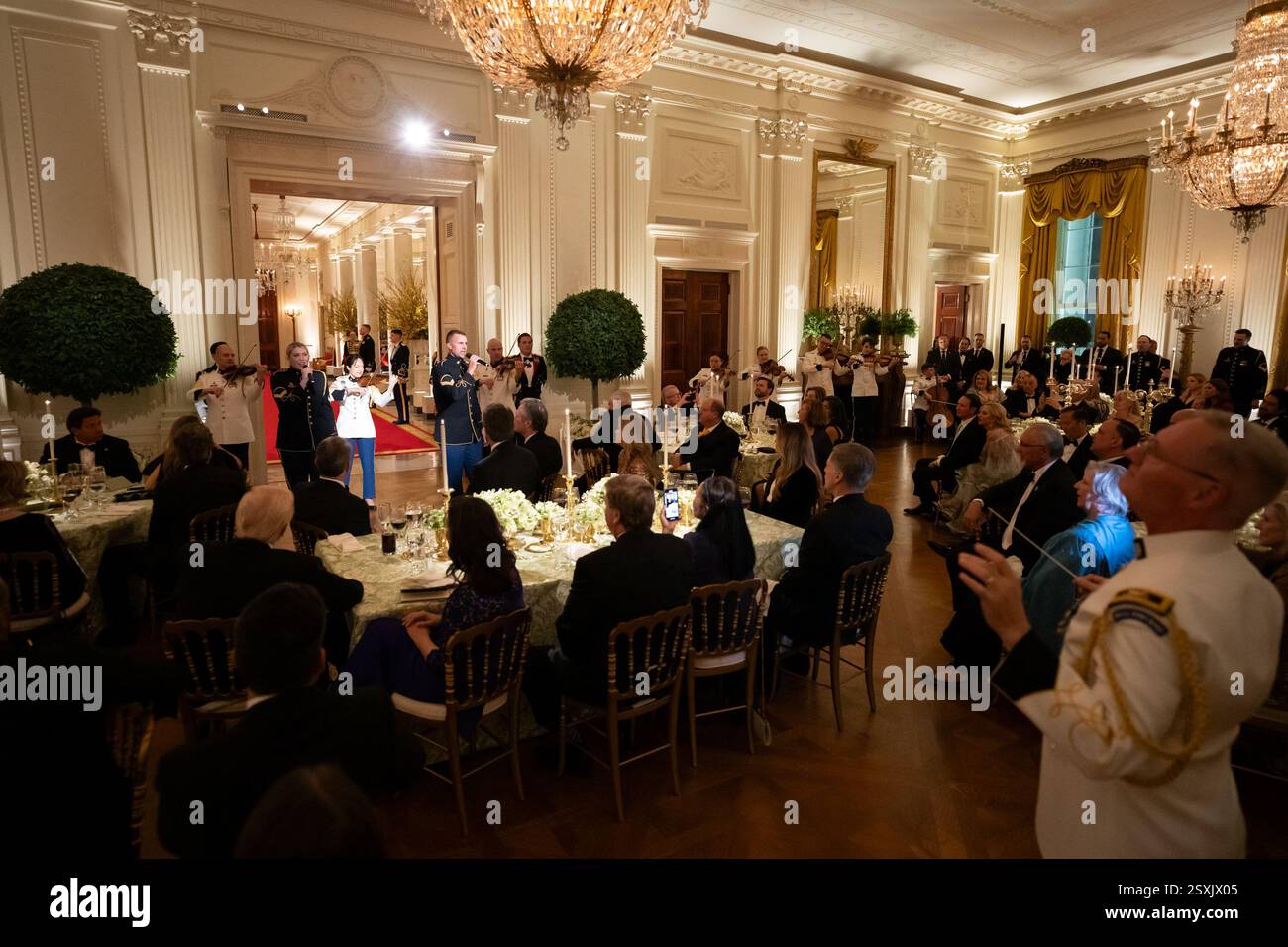 The United States Army Chorus and Strings performs for President Donald ...
