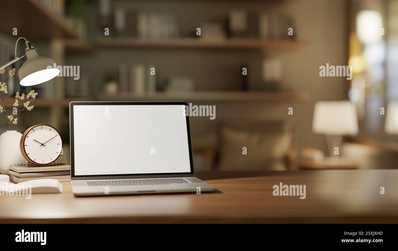 The white screen laptop on wooden table with decorative items in the ...