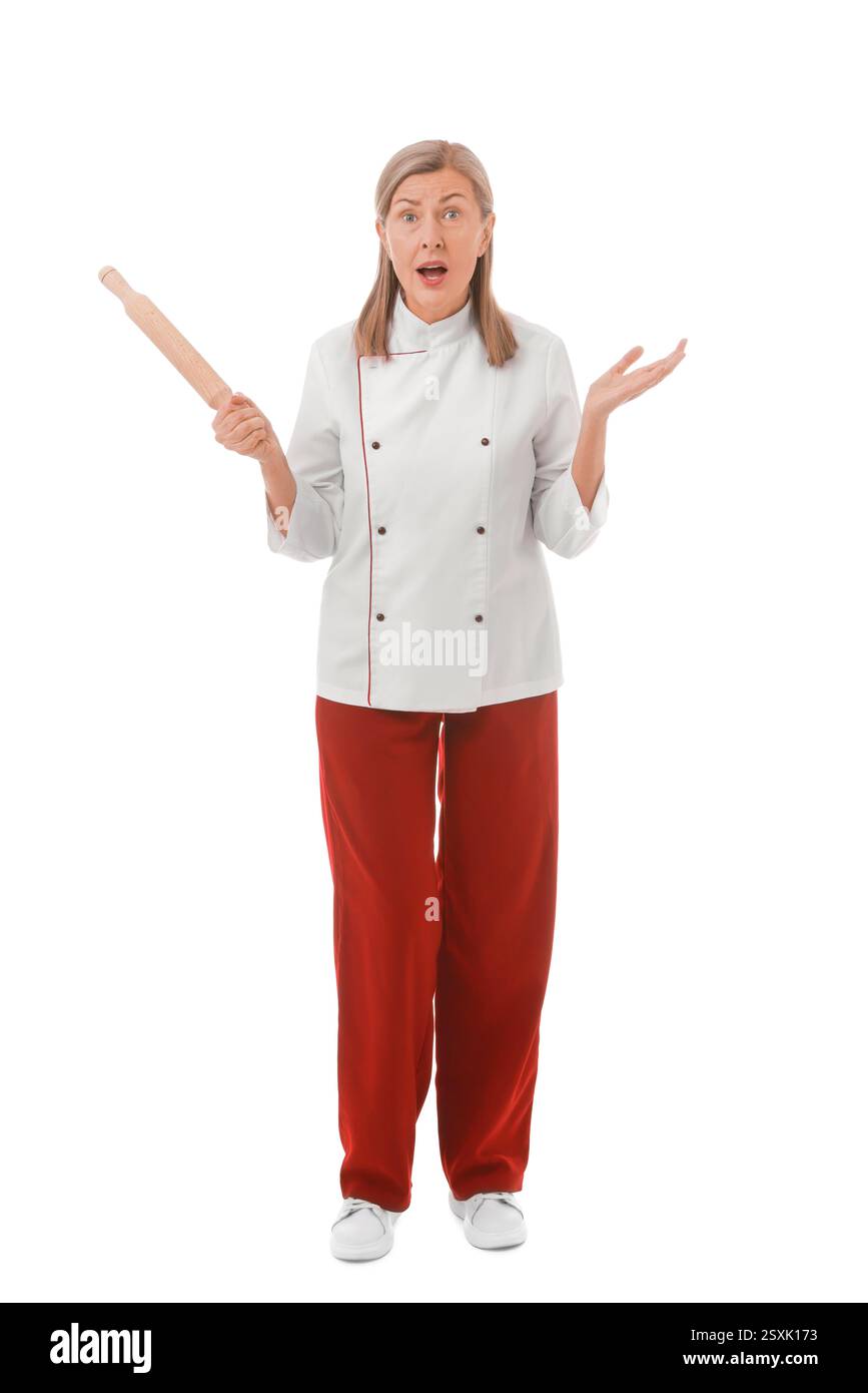 Surprised chef with rolling pin on white background Stock Photo - Alamy