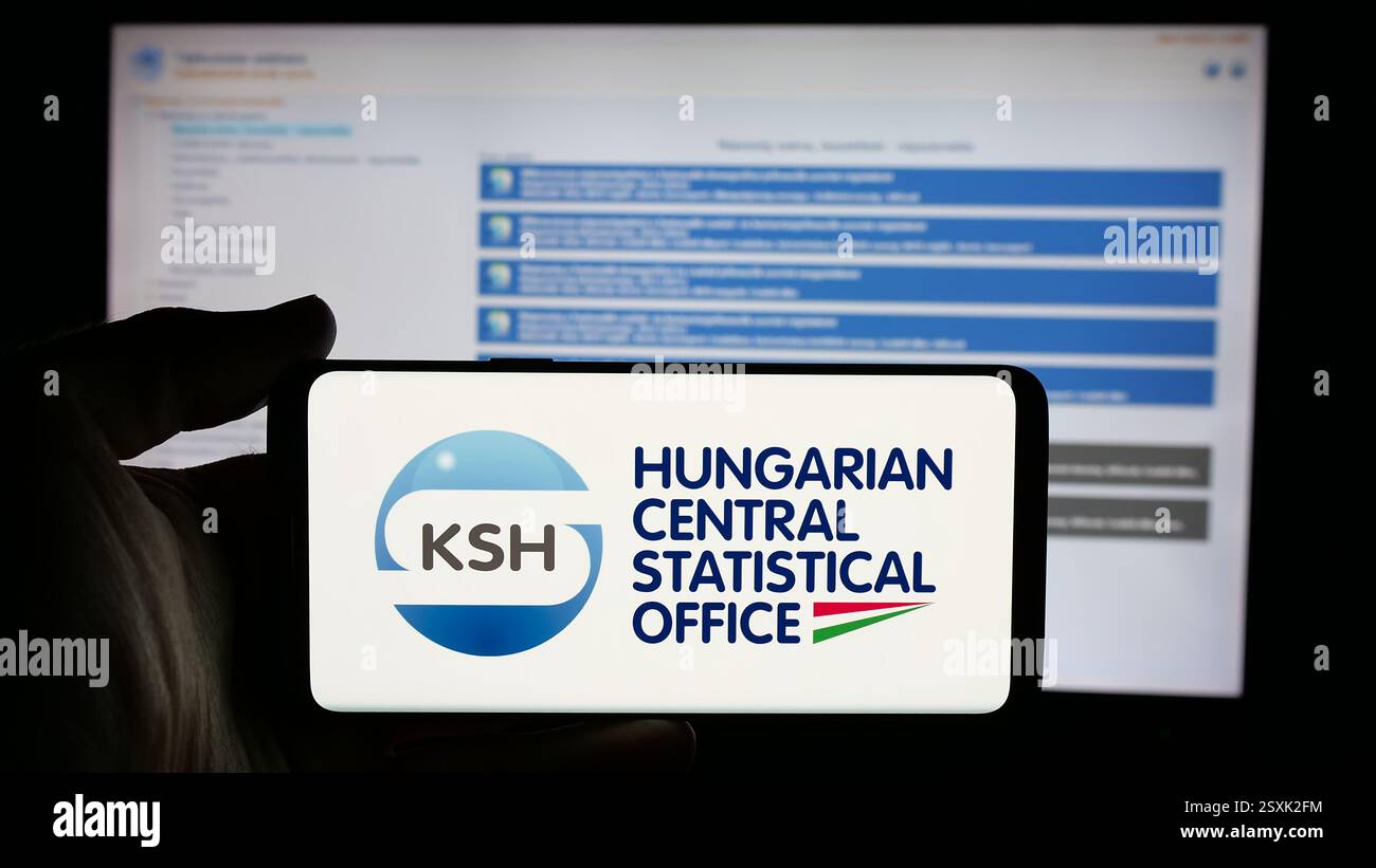 In this photo illustration, a cellphone with the logo of Hungarian Central Statistical Office ...