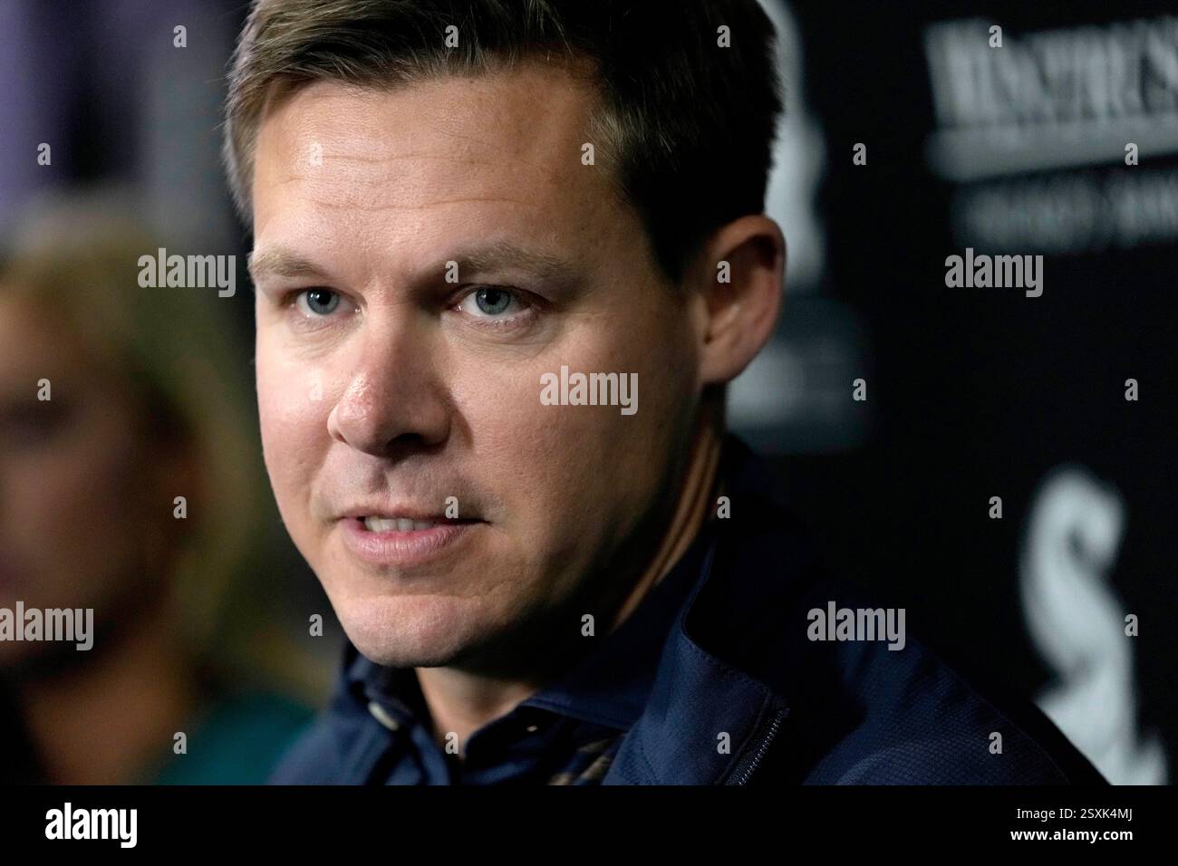 FILE - Chicago White Sox general manager Chris Getz talks with ...