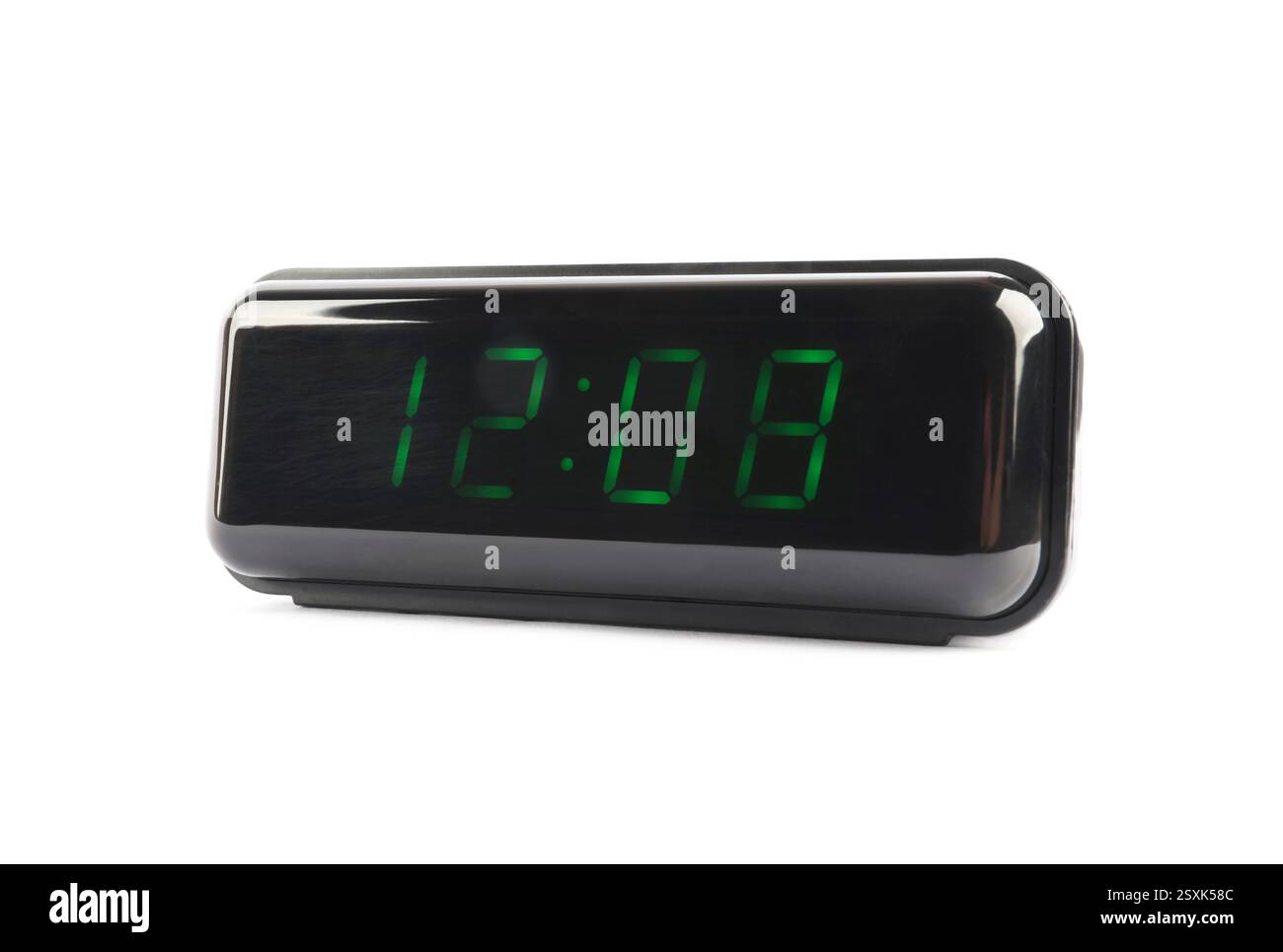 Digital alarm clock showing 12:08 o'clock on white background Stock ...