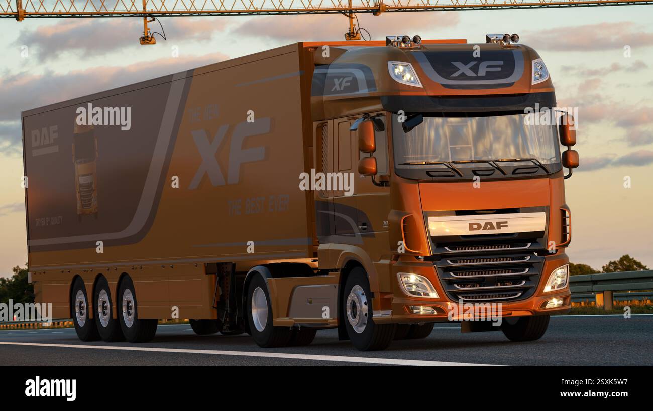 DAF XF Model Truck with company trailer on the highway Stock Photo - Alamy