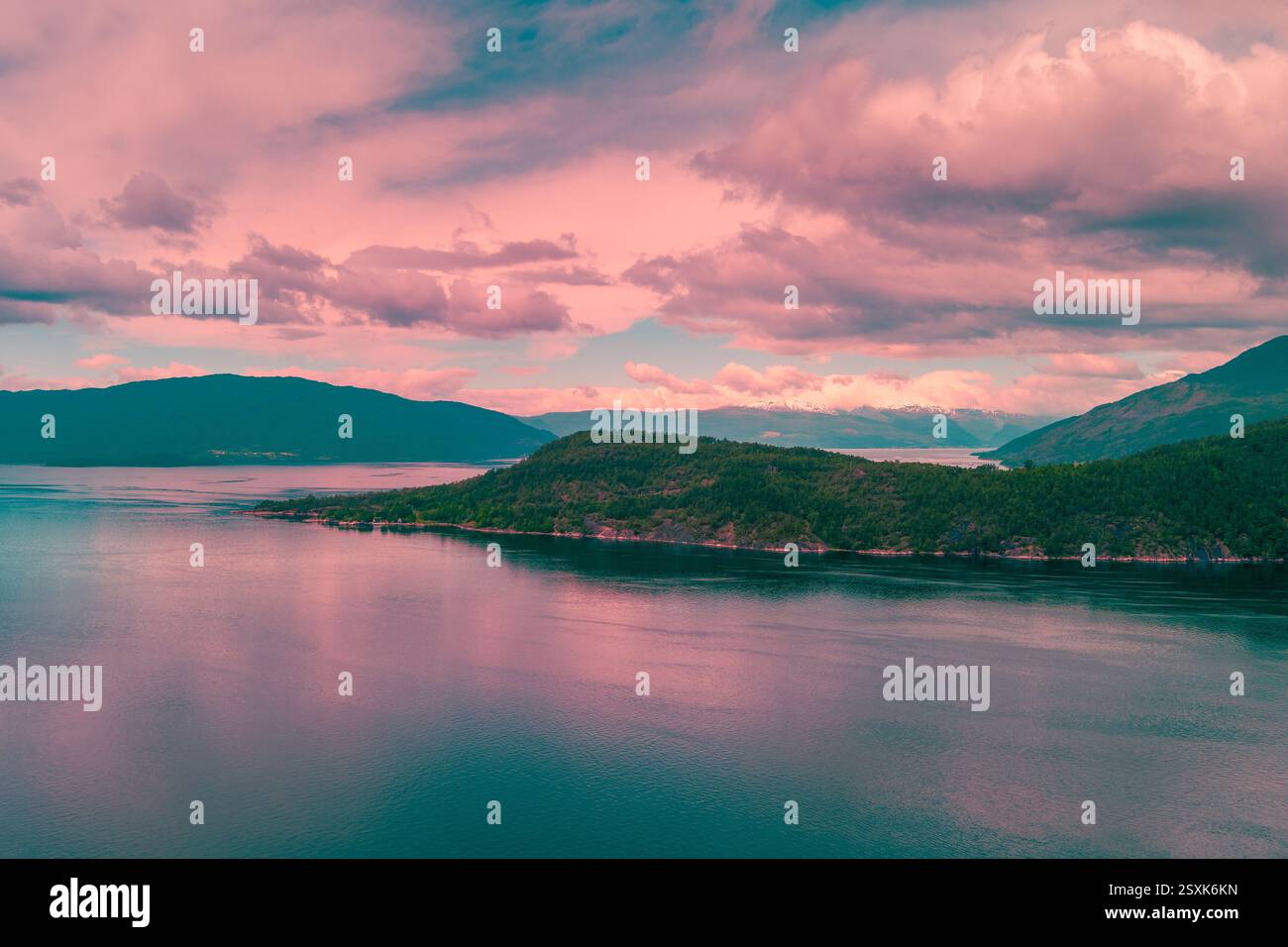 Fjord at sunset. Rocky coast in the evening. Hardanger Fjord. Beautiful ...