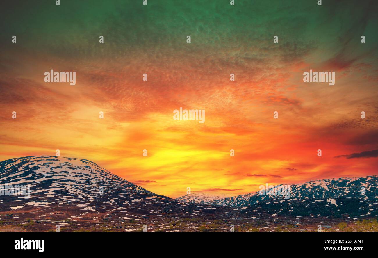 Mountain landscape with peaks covered with melted snow. Aerial view of ...