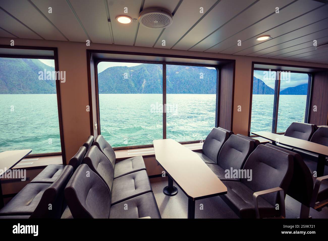 Sea cruise on a ship. View of the fjord from the boat. View through the ...